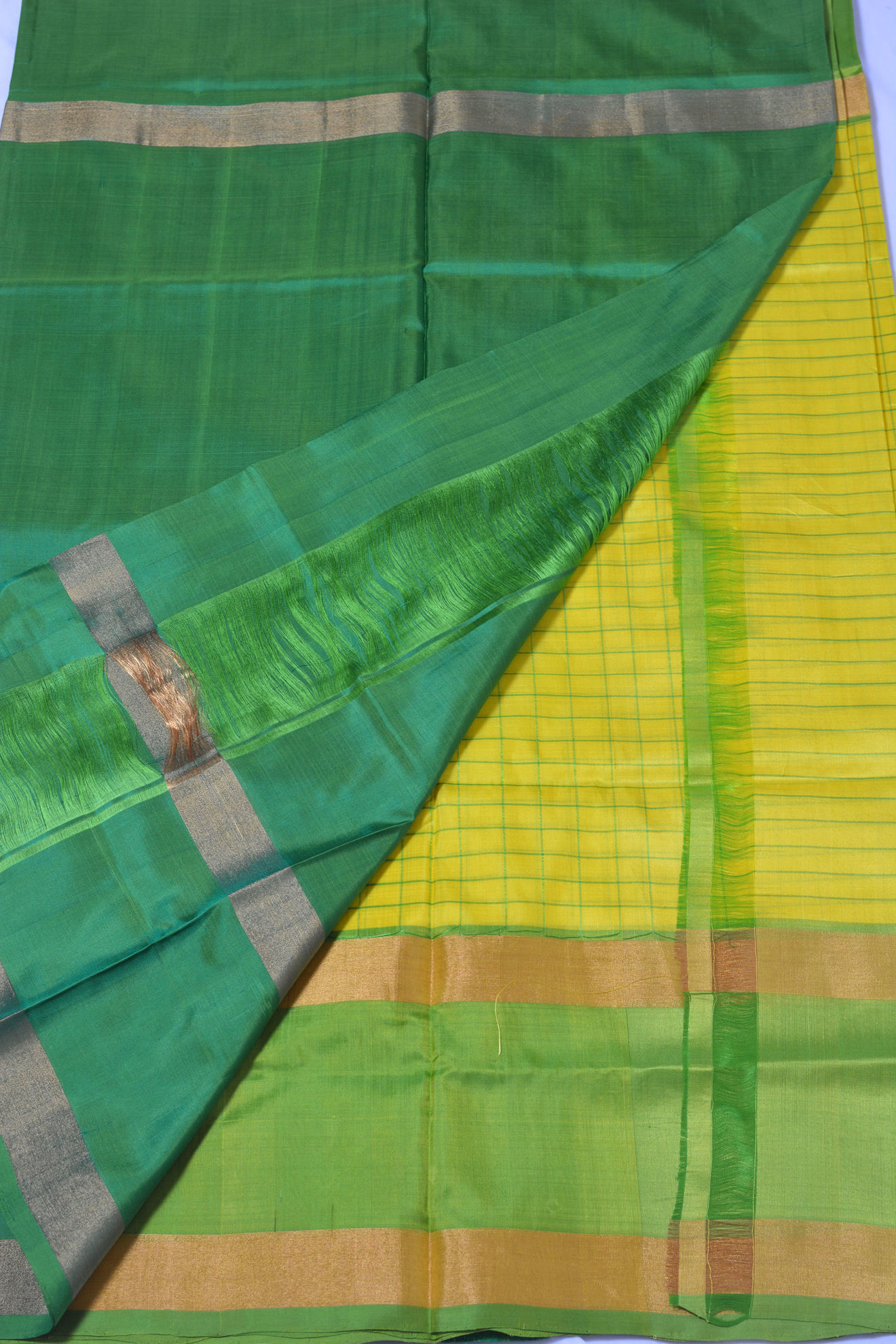 Tvis and Bliss. Yellow and Green Checks Uppada Silk Saree