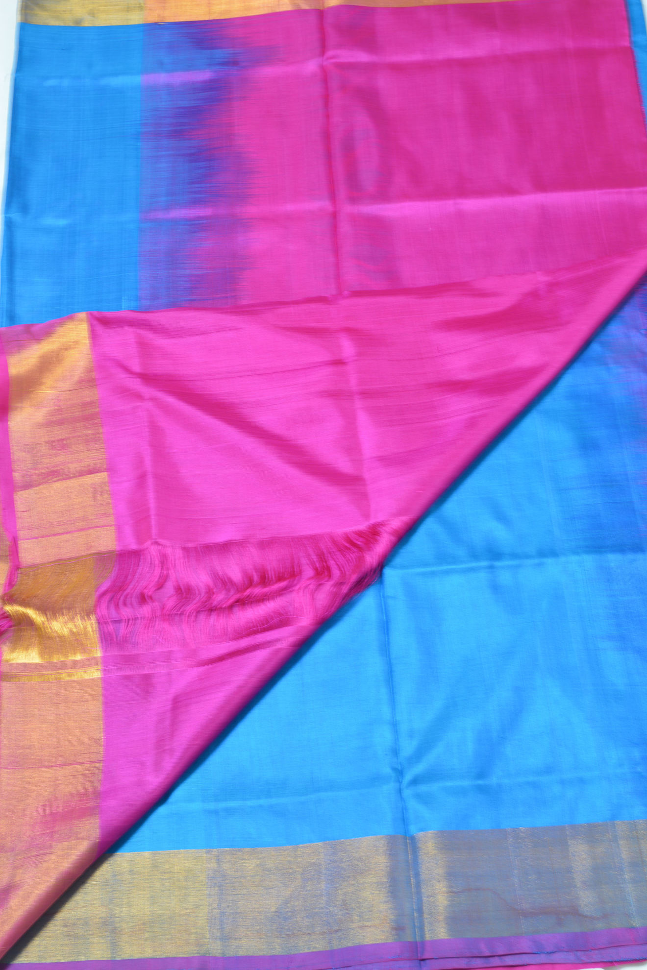 Tvis and Bliss. Anand Blue and Pink Uppada Silk Saree