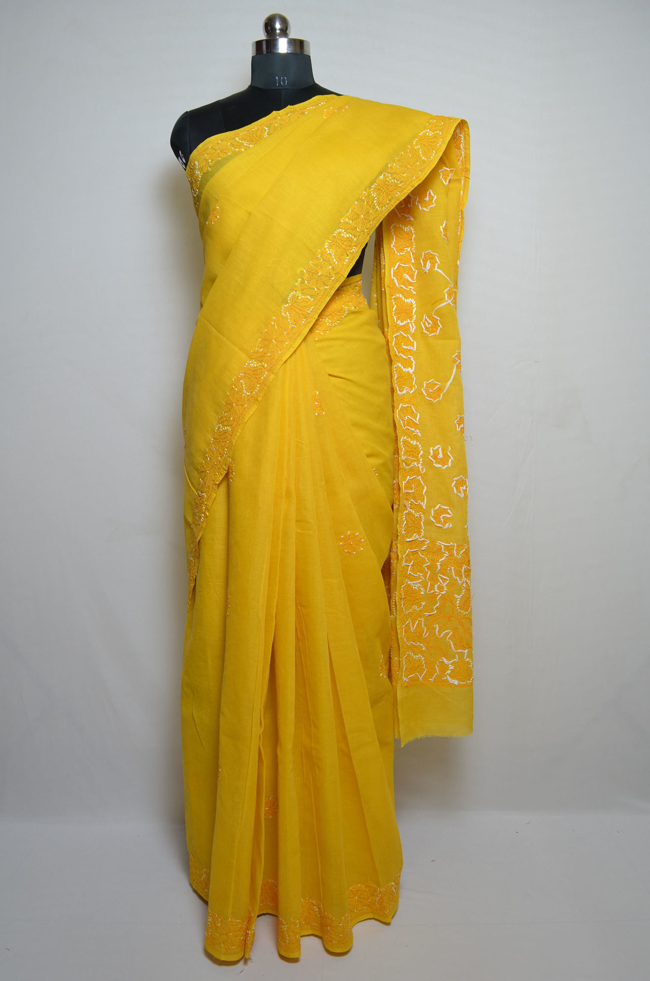 Tvis and Bliss. Mustard Yellow Lucknow Chikankari Embroidered Cotton Saree