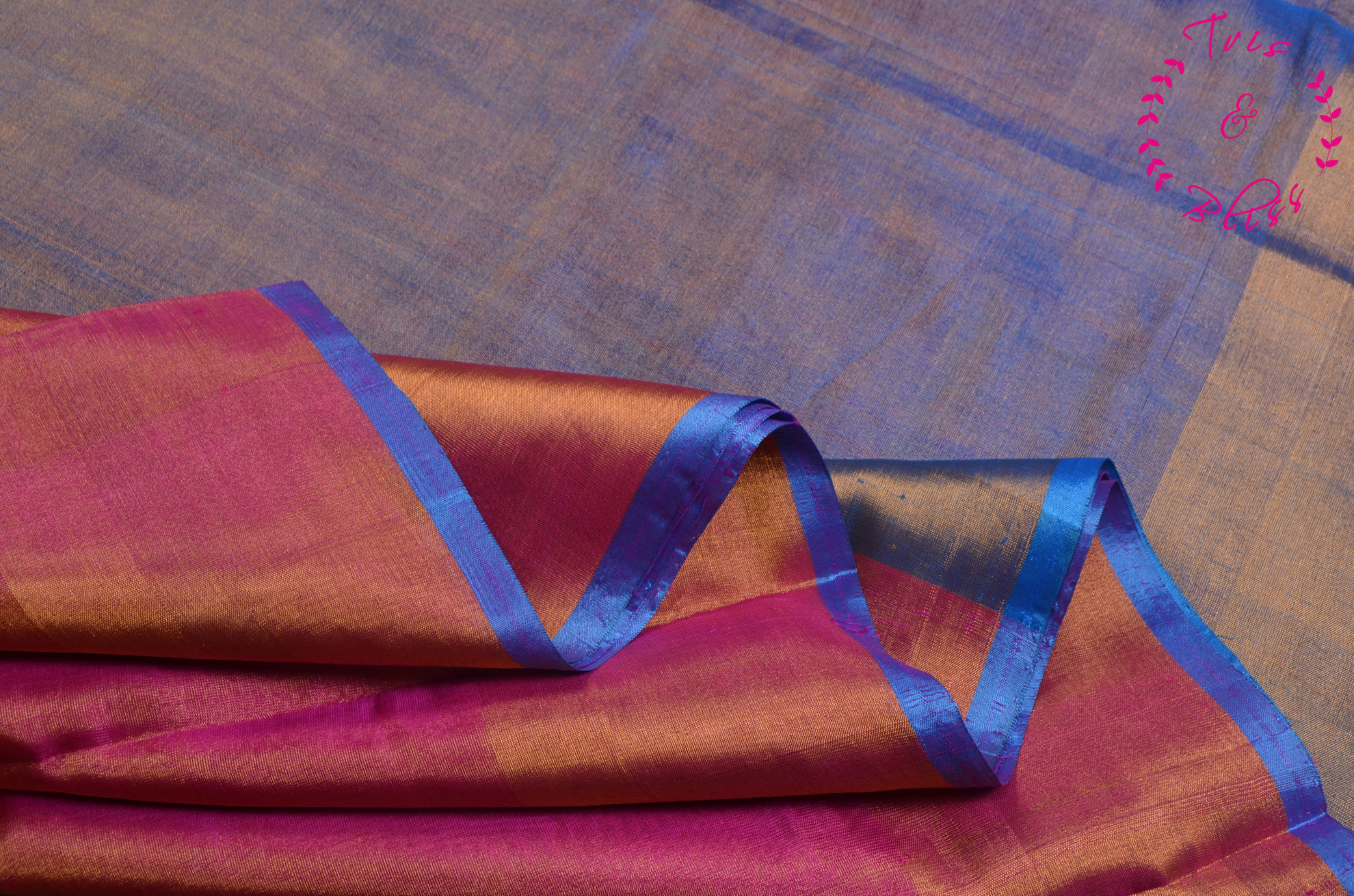 Tvis and Bliss. Pink and Anand Blue Uppada Full Tissue Silk Saree